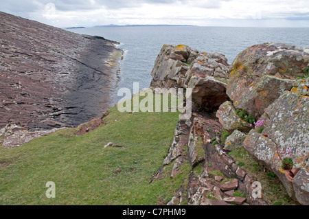Impressive rock formations on Scotland's north west coast between ...