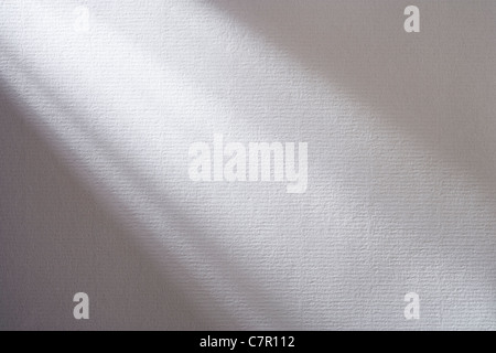 Shadows on textured white paper Stock Photo - Alamy