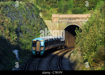 A Southern Rail train pulls out of Falmer station and into the nearby ...