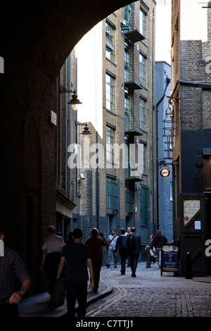 Clink street London, Clink prison and tall warehouses Stock Photo - Alamy