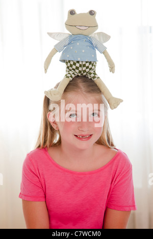 Frog on toy Stock Photo - Alamy
