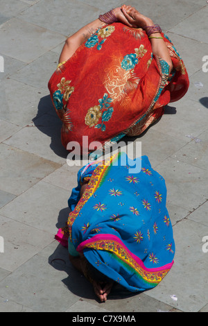 Devout woman prostrating at Kaila Devi Temple Rajasthan India Stock ...