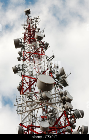 Communication transmitter tower with lots of antennas Stock Photo - Alamy