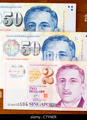 Close-up of Singapore banknotes dollars (50-100 SGD). As of 2016, the ...