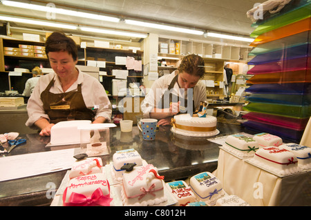 Two ladies decorating cakes in the Cake Shop, Indoor Market, Oxford ...