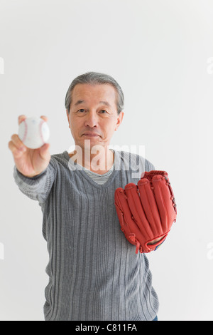 Senior Man with Baseball Mitt Stock Photo - Alamy