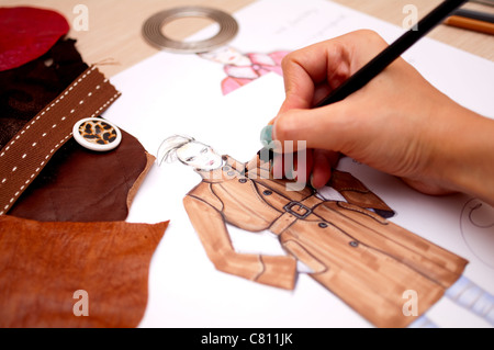Fashion design concept, Fashion designer drawing new collection clothes ...