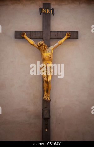 A statue of Jesus Christ crucified against unusual dramatic sky Stock Photo - Alamy