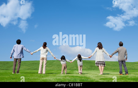 Three generations holding hands Stock Photo - Alamy