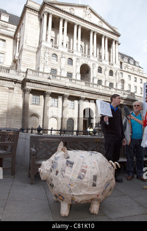 Campaigners from Save Our Savers protest outside the Bank of England ...
