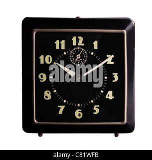 black vintage alarm clock on the black background Stock Photo - Alamy