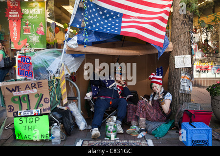 A "Occupy Seattle" sign and an American flag Stock Photo - Alamy