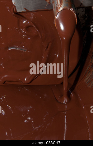 pouring dark melted chocolate Stock Photo - Alamy