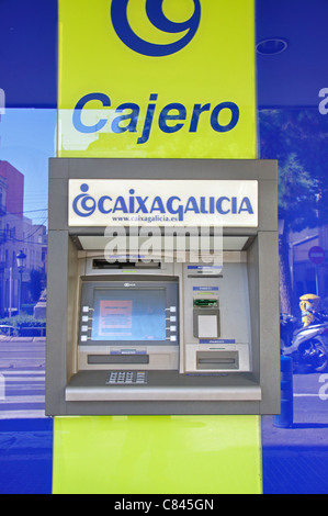 Foreign tourists use an ATM machine in downtown Havana, Cuba, Sunday ...