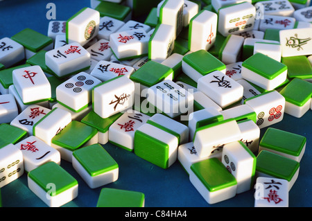 Mahjong set of character cards or tiles, arranged in a line with values ...