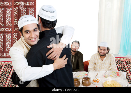 Muslim men greeting each other Stock Photo - Alamy