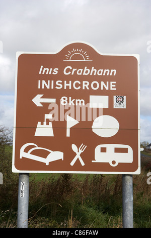 Road signs and a brown tourist information sign in Leicestershire, uk ...