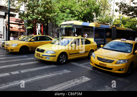 Yellow Greek taxi cab in Athens, Greece Stock Photo - Alamy