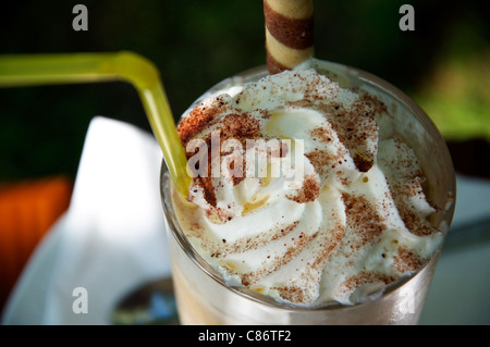 Delicious cold drink – iced coffee with ice and cream Stock Photo - Alamy