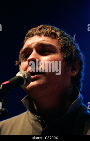 Andy Nicholson, bass guitar with the Arctic Monkeys performs on stage ...