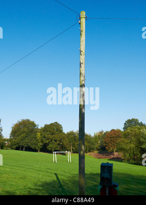 An empty goalpost at a park Stock Photo - Alamy