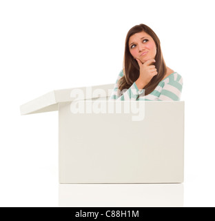 Girl popping out of a cardboard box Stock Photo - Alamy