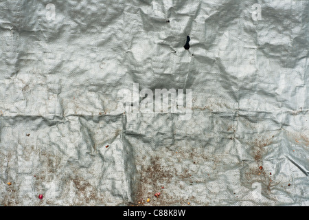 Silver tarp dirty and wrinkled texture background Stock Photo - Alamy
