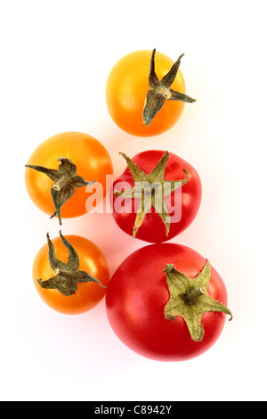 cut red and yellow tomatoes Stock Photo - Alamy