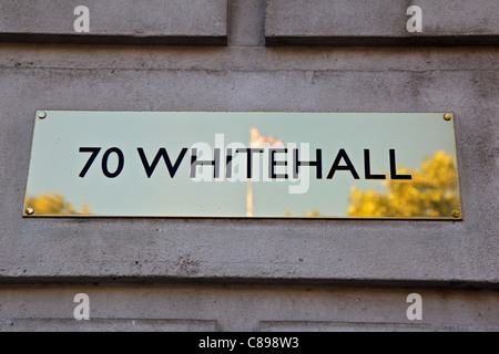 Cabinet Office sign on the 70 Whitehall with the reflection of the ...