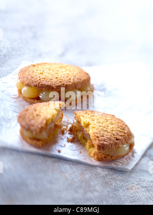 Shortbread cookies filled with lemon curd Stock Photo - Alamy