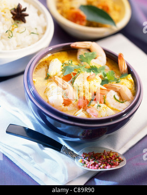 Monkfish and prawns curry Stock Photo - Alamy