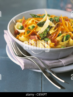 Baby cooking pasta Stock Photo - Alamy