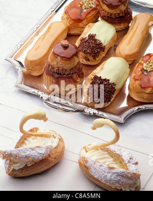 Coffee religieuse cake Stock Photo - Alamy