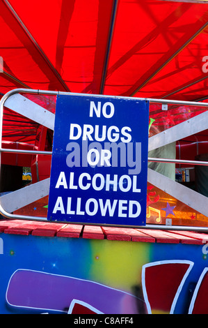 Fairground safety notice Stock Photo - Alamy