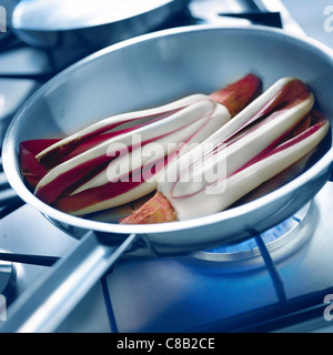 Frying pan cooking lettuce in a Bangkok kitchen in Thailand Stock Photo ...
