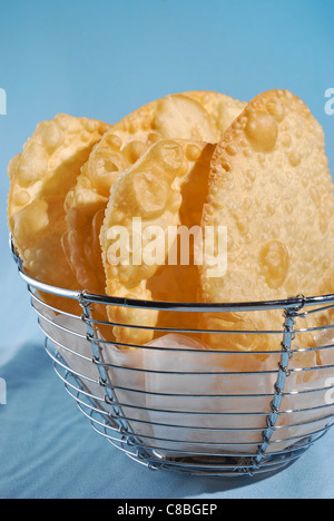 Fried crackers, a popular Dominican street food Stock Photo - Alamy