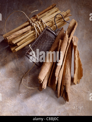 Cinnamon and grater Stock Photo - Alamy