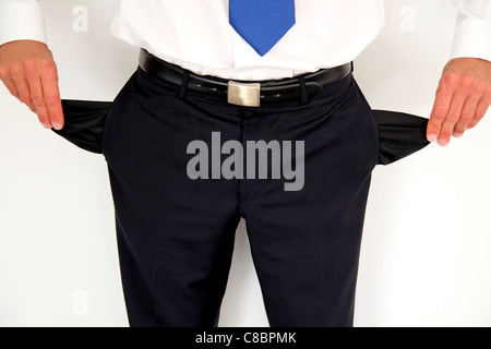 broke unsuccessful business man with pockets turned inside out without ...