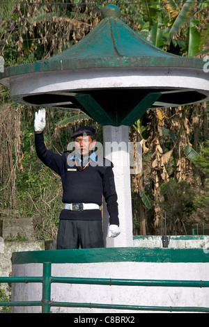 Traffic Policeman on Point duty on a traffic island in the old quarter ...