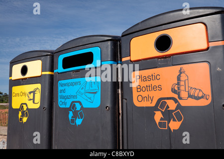 Britain UK Three colour coded stainless steel recycling bins inside ...