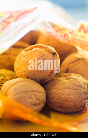 a bag full of walnuts Stock Photo - Alamy