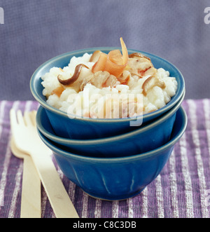 Porcini mushroom risotto with raw ham and side dish. Top view Stock ...