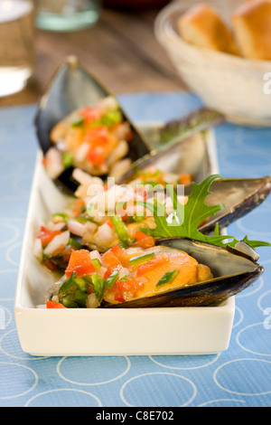 Mussels Cooked in White Wine with Parsley and Garlic Stock Photo - Alamy