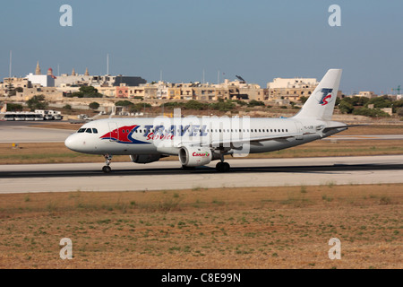 Airbus A320 jet get service on airport apron. Jet bridge, aviation fuel ...