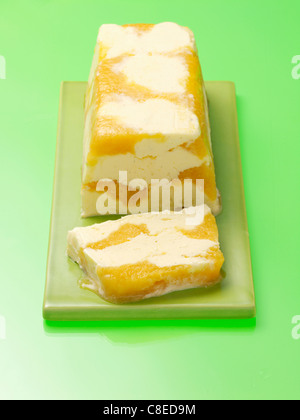 Mango ice cream log cake Stock Photo - Alamy