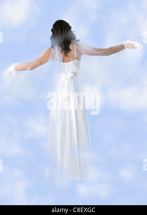 Illustration abstract white angel. Sky clouds with bright light rays ...
