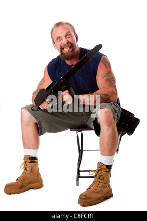 Crazy guy with chainsaw Stock Photo - Alamy