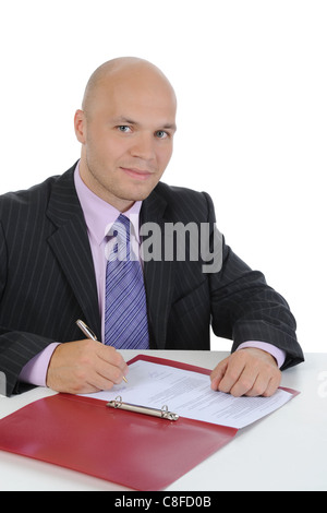Businessman signs a contract. Holding pen in hand Stock Photo - Alamy