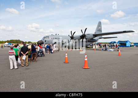 People line up to walk through a Hurricane Hunter Lockheed WC-130 ...