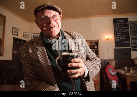 Suffolk raconteur, comedian and author Charlie Haylock having a pint of ...